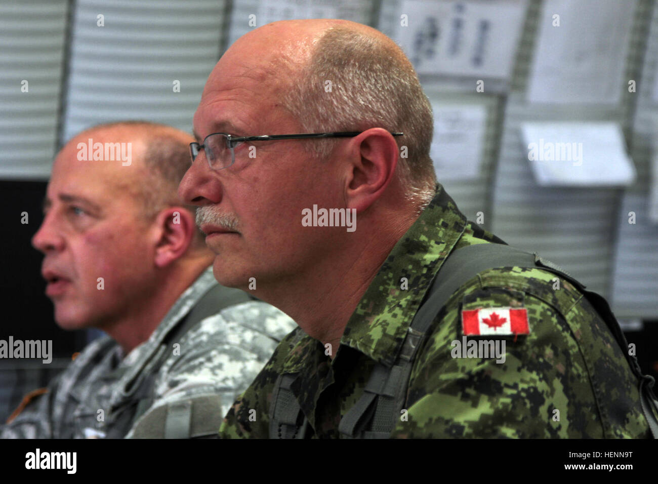 Canadian Army Reserve Chief of Staff Brig. Gen. Kelly Woiden watches ...