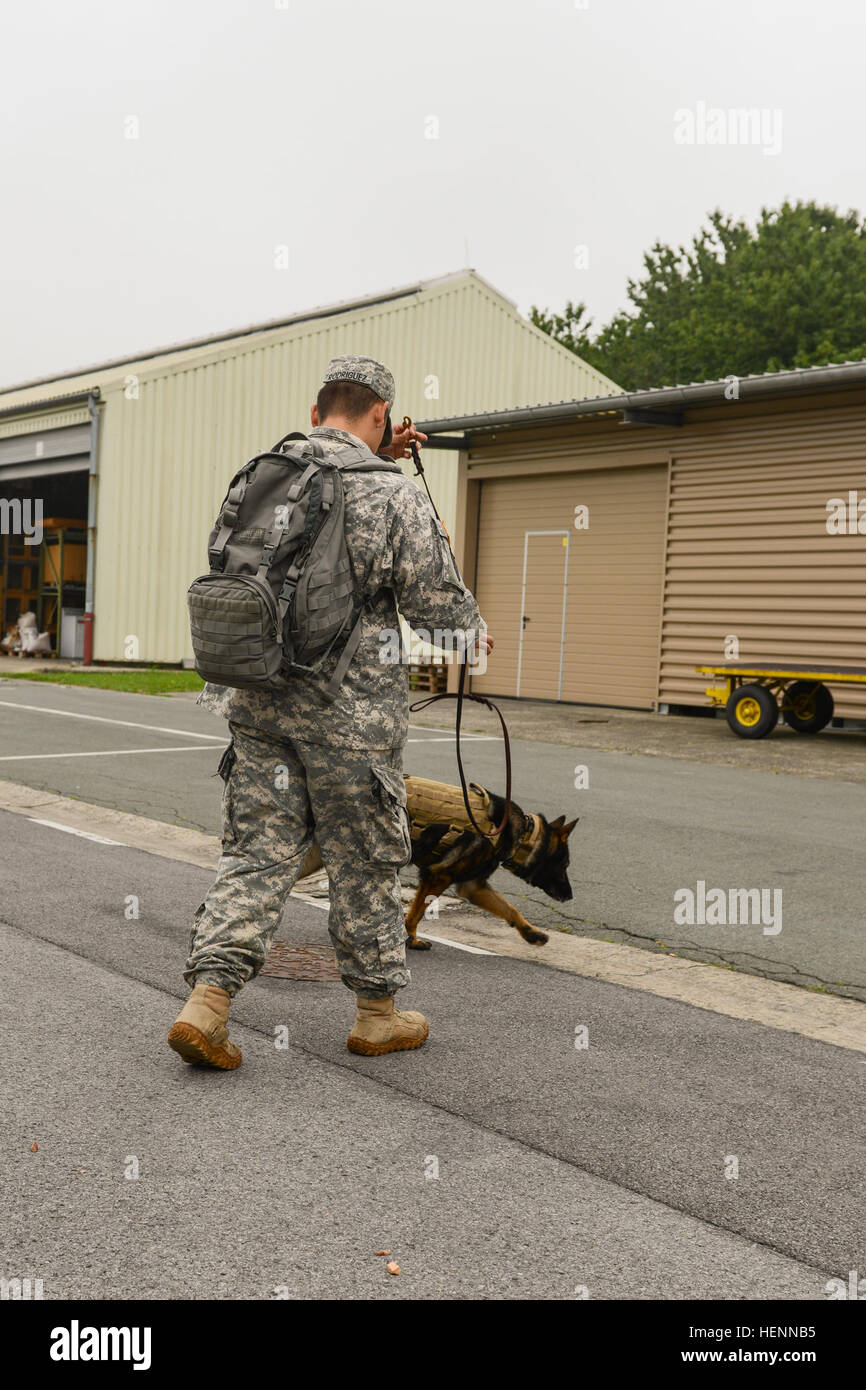 U.S. Army Spc. Jacob Rodriguez, military dog handler and Eros, a 7-year ...