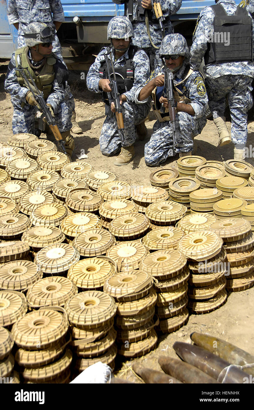 After receiving a tip, Iraqi national police discovered a weapons cache ...