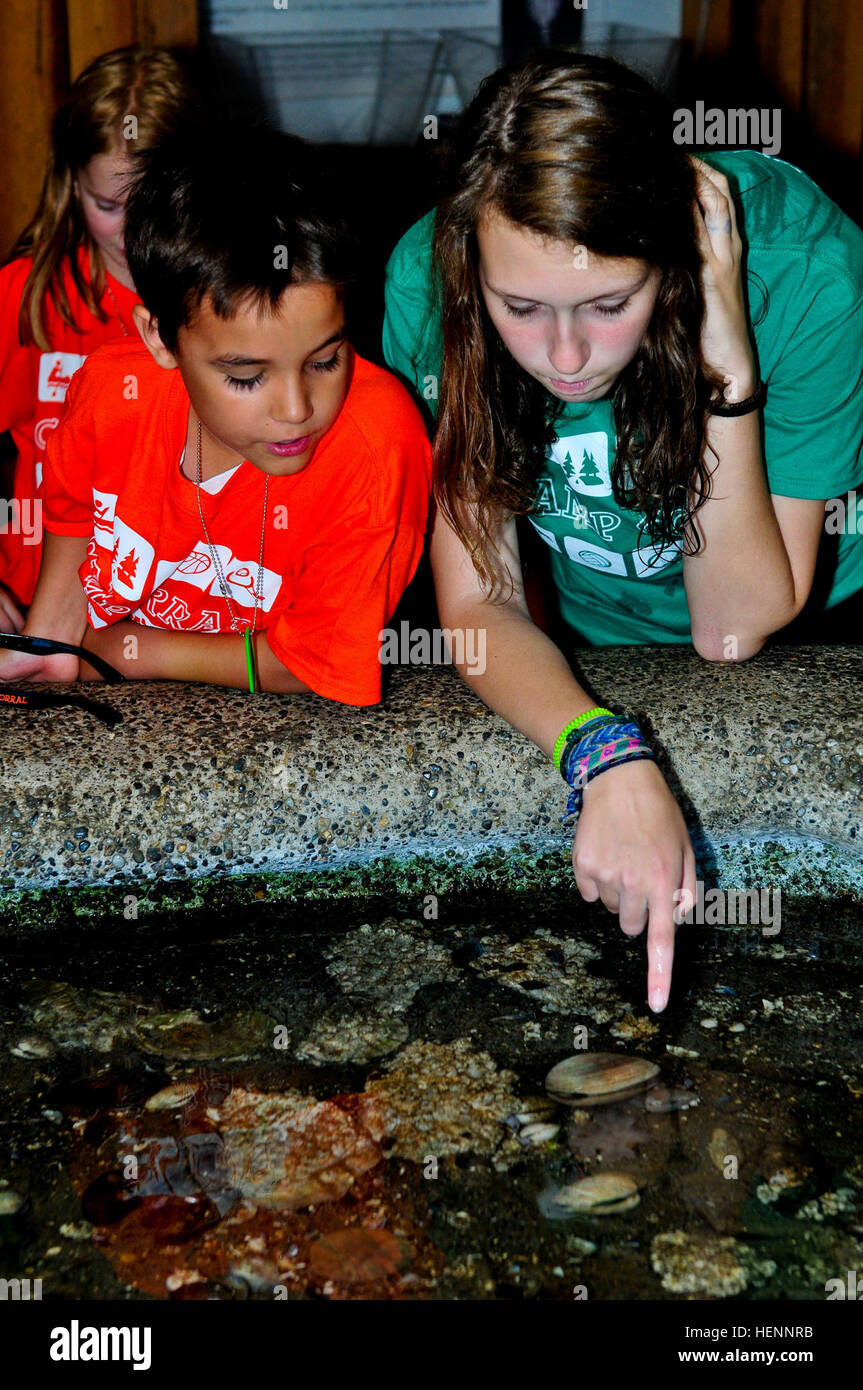 Nathan Kempton, 10-year-old resident of Portland, Ore., learns about ...