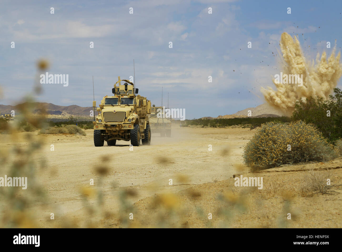A simulated Improvised Explosive Device (IED) detonates near an Alpha ...