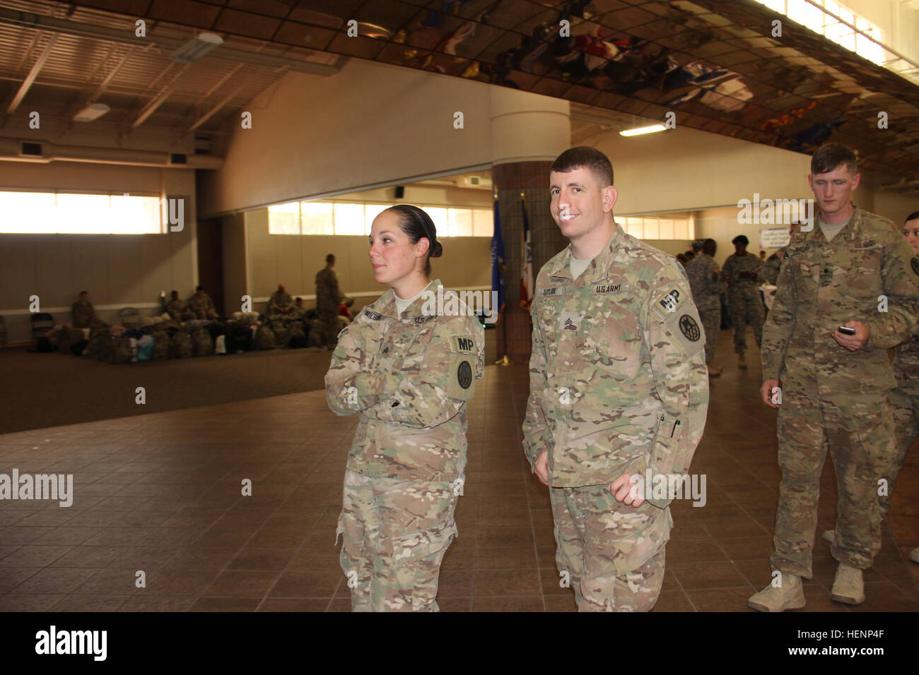 Sgt. Caitlyn Wilson, left, and Sgt. Ruble Taylor, right, both military ...