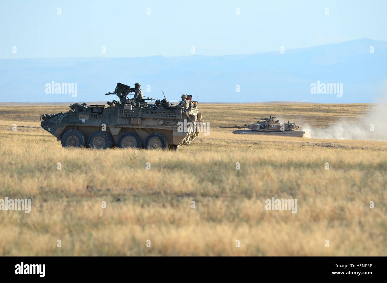 An M1134 Anti-Tank Guided Missile Vehicle (left) from 1st Squadron ...