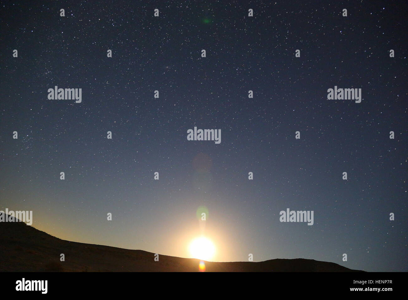 The moon rises over the horizon during Decisive Action Rotation 14-09 ...