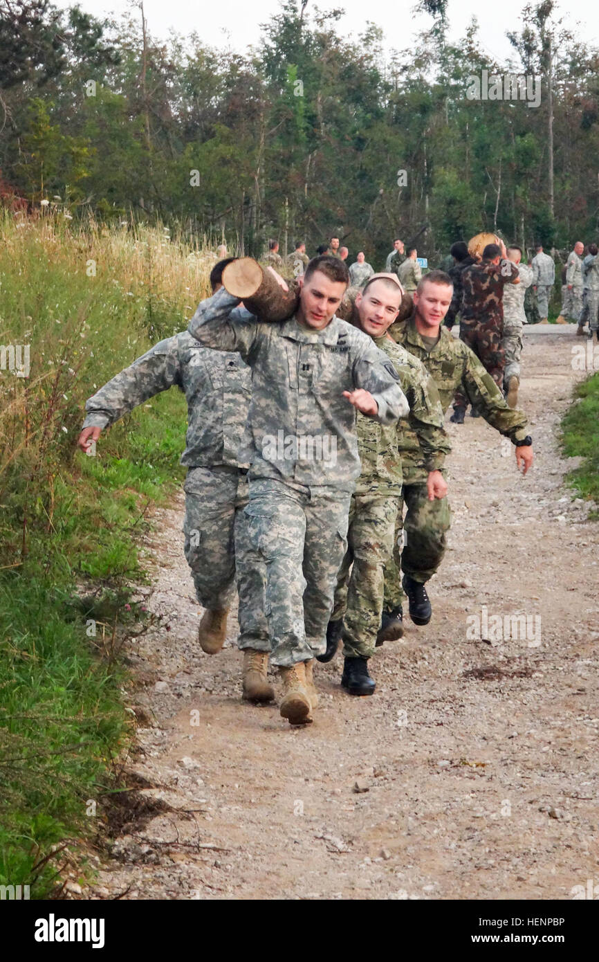U.S. Army Capt. Brian Williams, 173rd Airborne Brigade, leads a log run ...