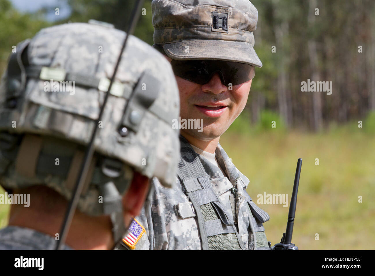 Army Reserve Capt. Carmelo Colon talks with Lt. Col. Damien Garner ...