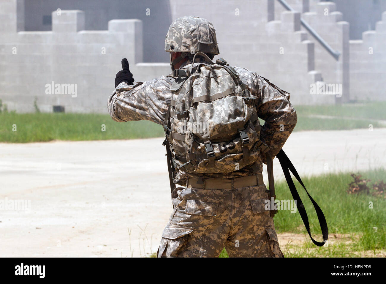 Army Reserve military police Soldier directs his squad while providing ...