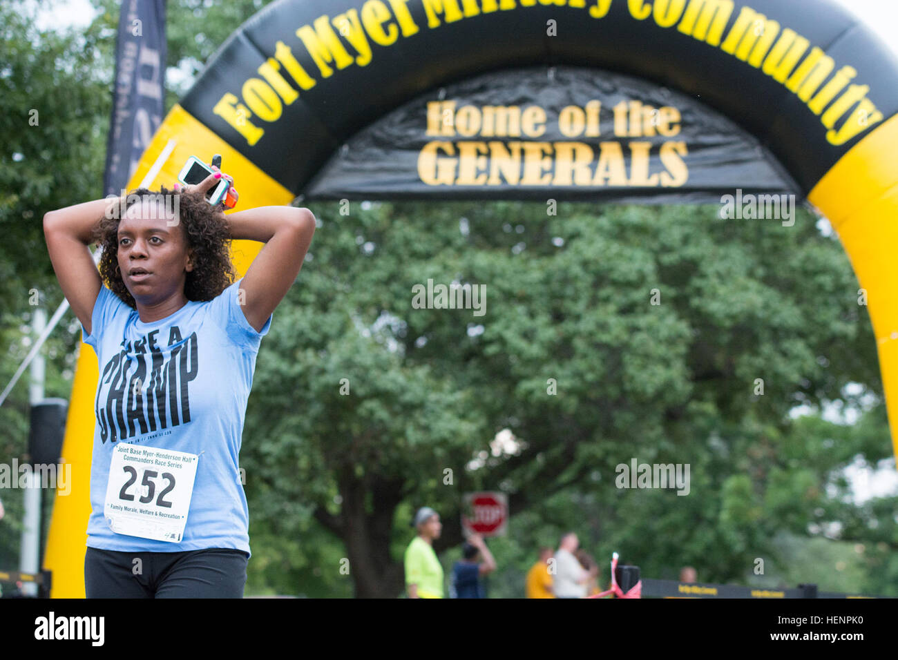 A competitor from the Women's Equality Day 5k run and 1-mile walk ...