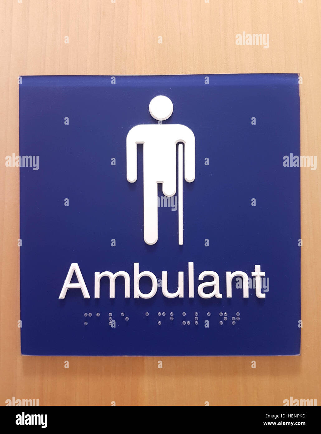 disability sign with icon and braille alphabet in bathroom Stock Photo ...