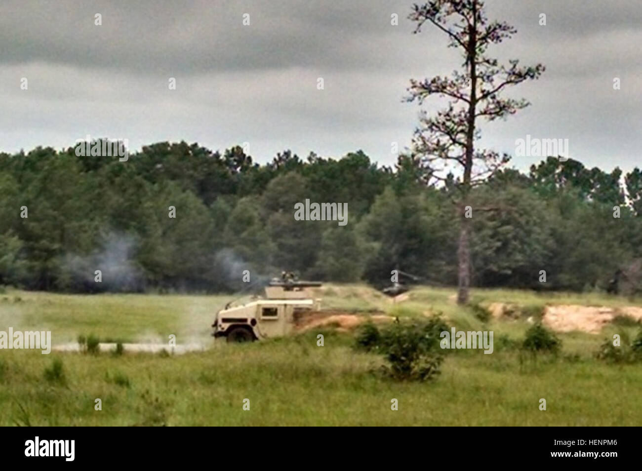 A TOW missile fired from a Humvee recoils after soldiers from Company D ...
