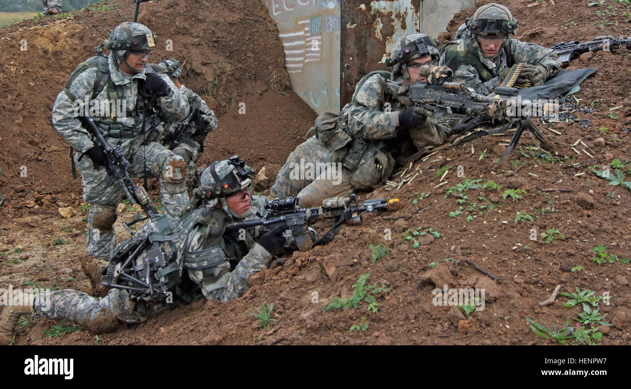 On the ground, from left, U.S. Army Pvt. Alex Willick, Spc. Hunter ...