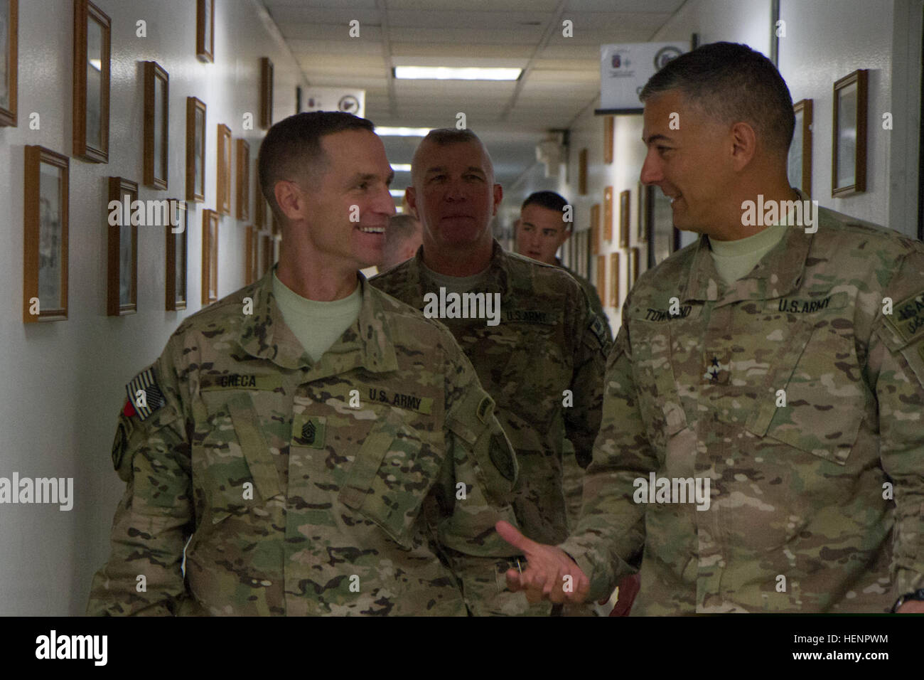 U.S. Army Command Sgt. Maj. Christopher Greca, left, with U.S. Central ...