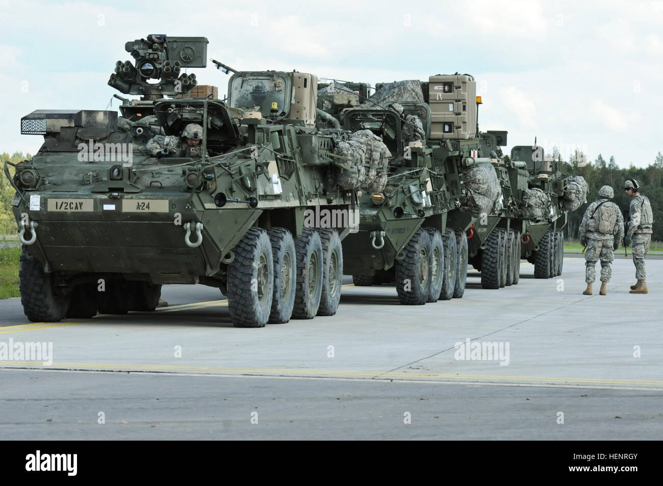 Troops from Apache Troop, 1st Squadron, 2d Cavalry Regiment prepare to ...