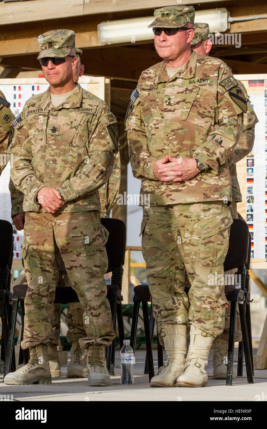 U.S. Army Maj. Gen. Michael Bills, right, the commanding general of ...