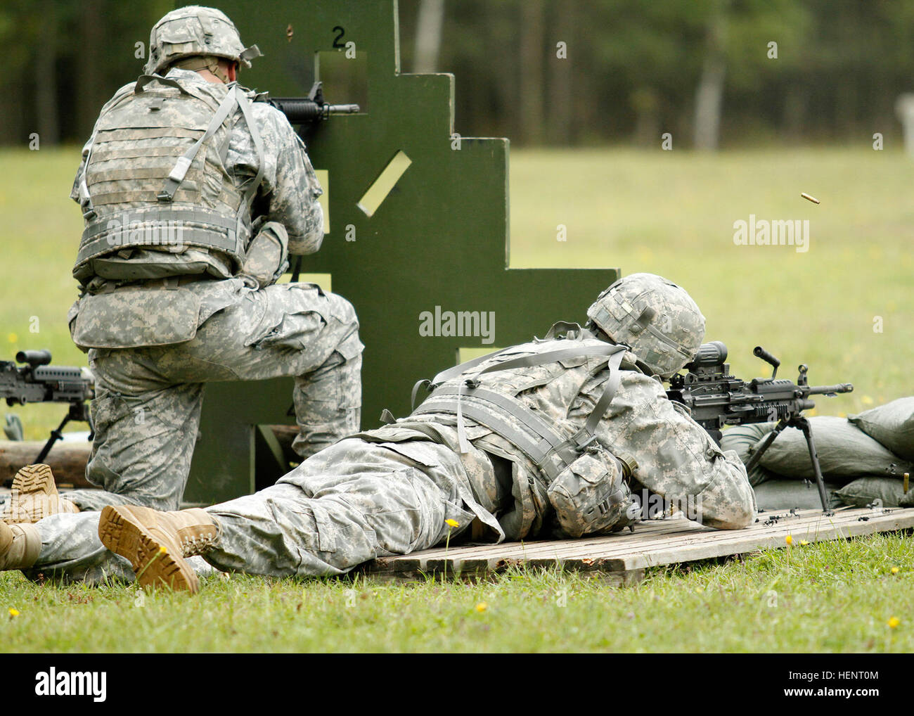 First Lt. Michael Theising (right), an engineer plans officer with the ...