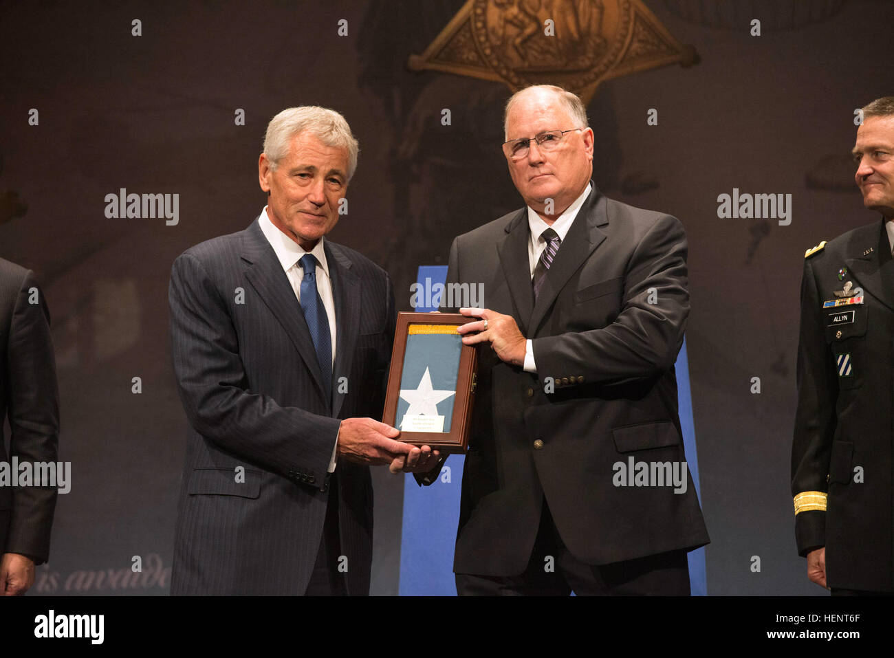 The U.S. Army inducts Army Spc. 4 Donald P. Sloat into the Pentagon's ...