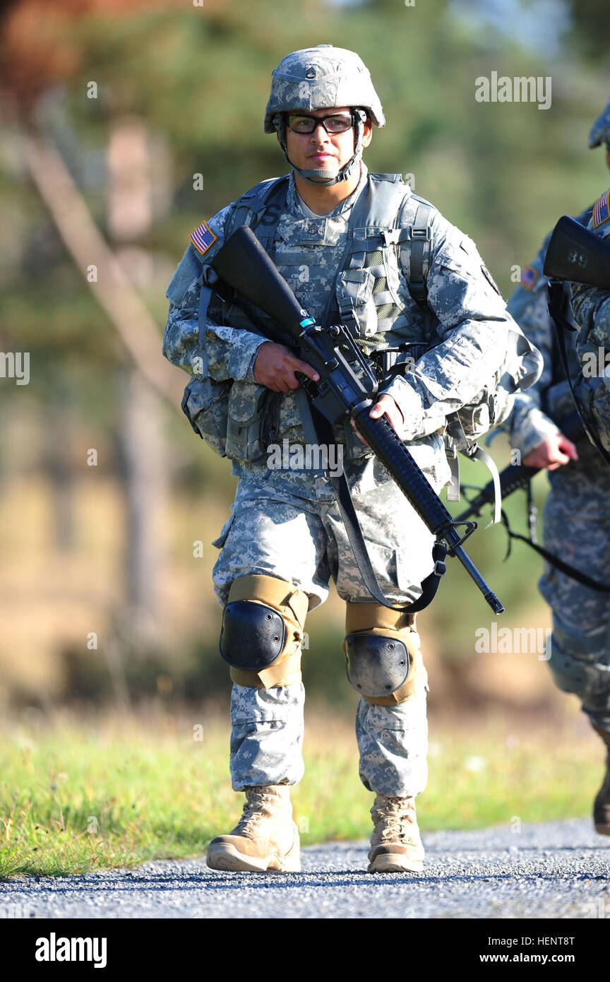 U.S. Army Staff Sgt. Miguel Garza, assigned to Public Health Command ...