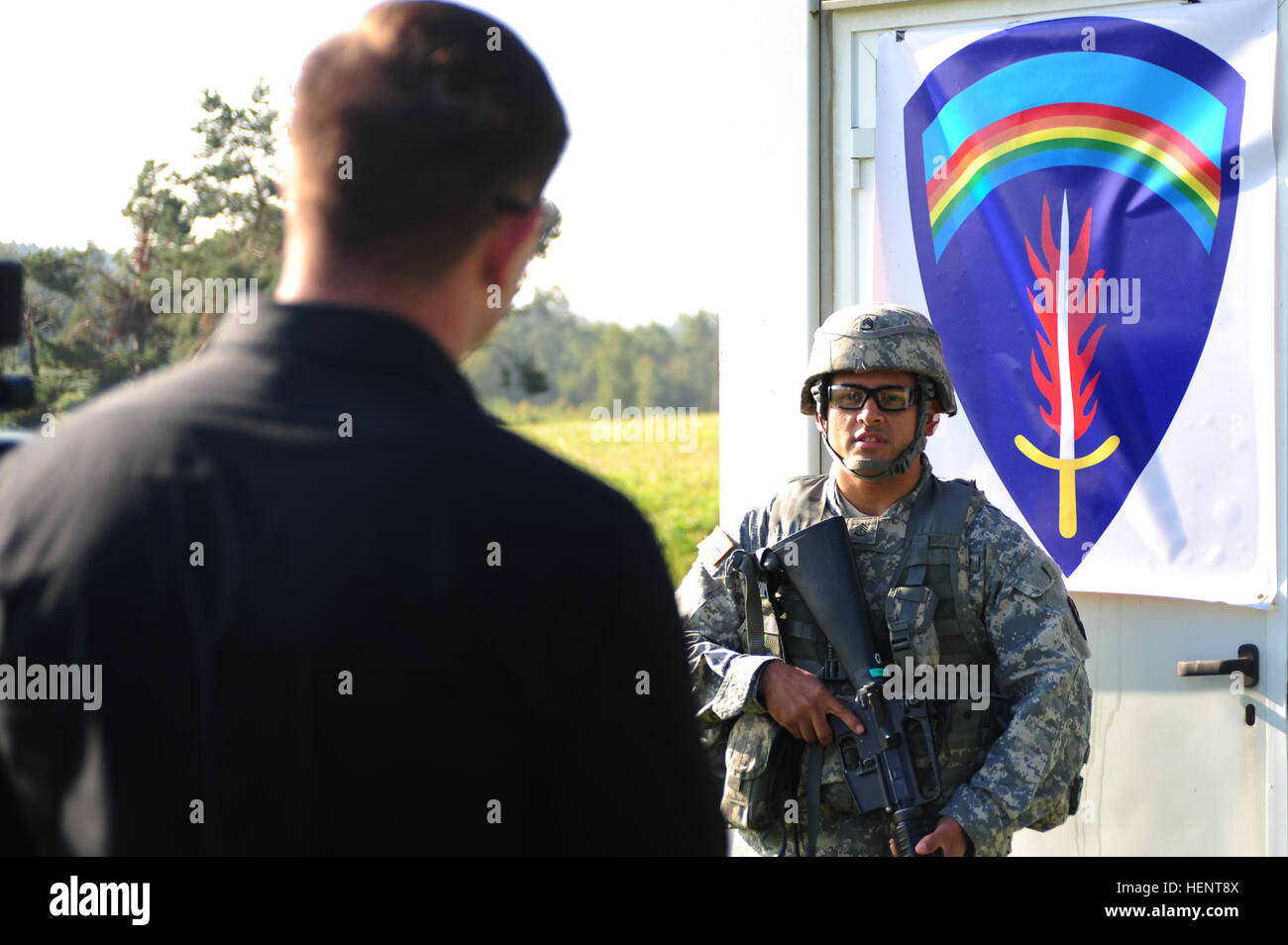 U.S. Army Staff Sgt. Miguel Garza, assigned to Public Health Command ...