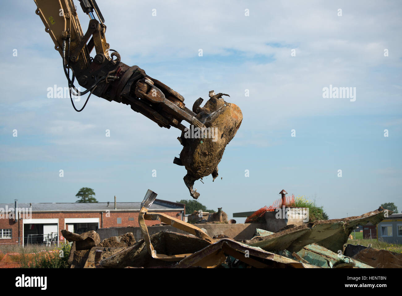 The 5000+ PSI demolition shear jaws of a tracked hydraulic excavator ...