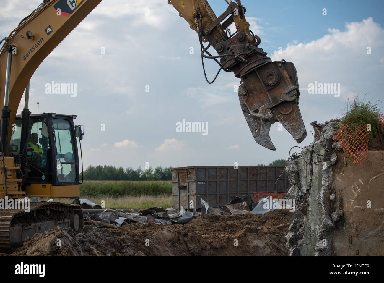 The 5000+ PSI demolition shear jaws of a tracked hydraulic excavator ...
