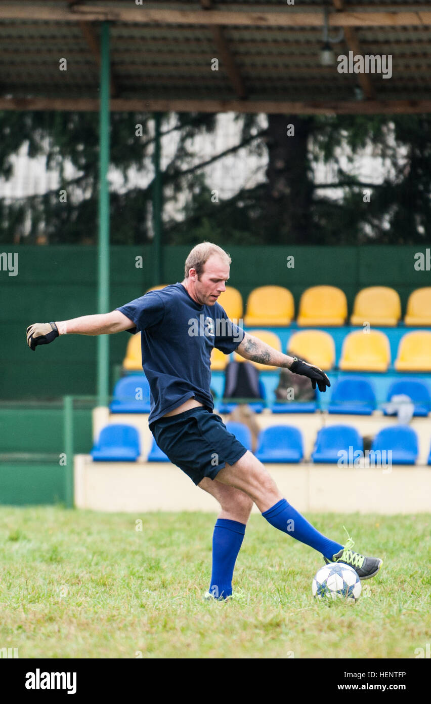 British Soldiers play a game of soccer during some free time at Rapid ...