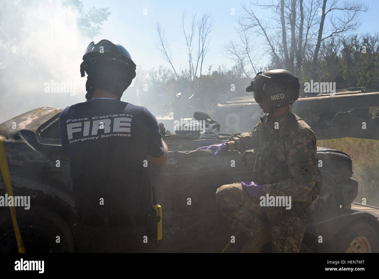 Fort Carson Fire Department firefighters and a flight medic from ...