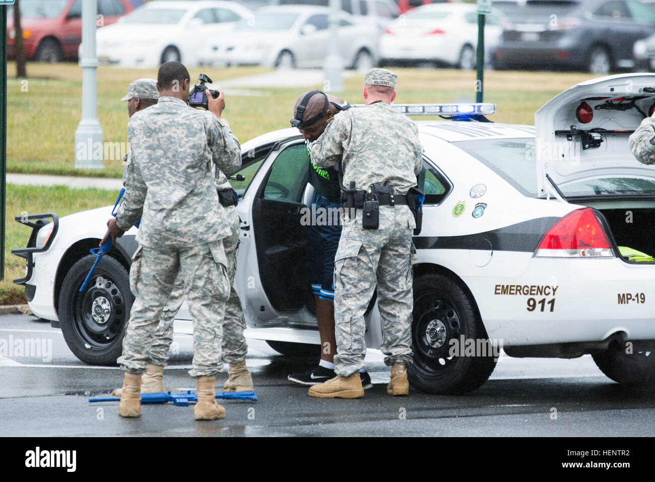 Members of 289th Military Police Company detain a role-player on the ...