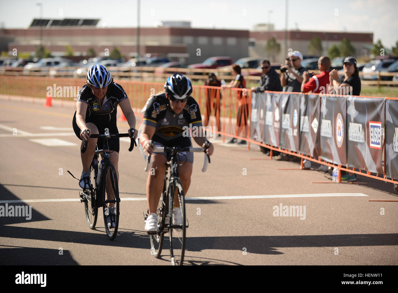 Competitors in the Women’s Open Cycle prepare to cross the finish line ...