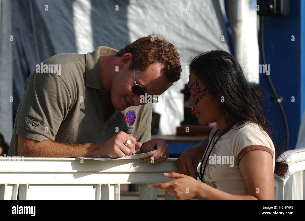 Actor Cole Hauser signs an autograph for a young fan. Cole Hauser ...