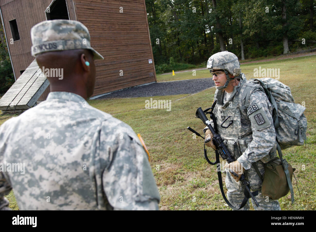 U.S. Army Spc. Thomas Boyd receives instruction to get supplies during ...