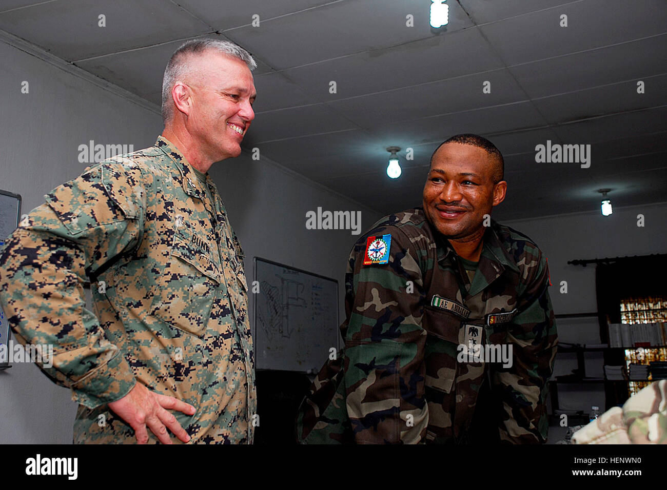 U.S. Marine Col. David. S. Bunn speaks with Nigerian Col. A.E. Abu ...