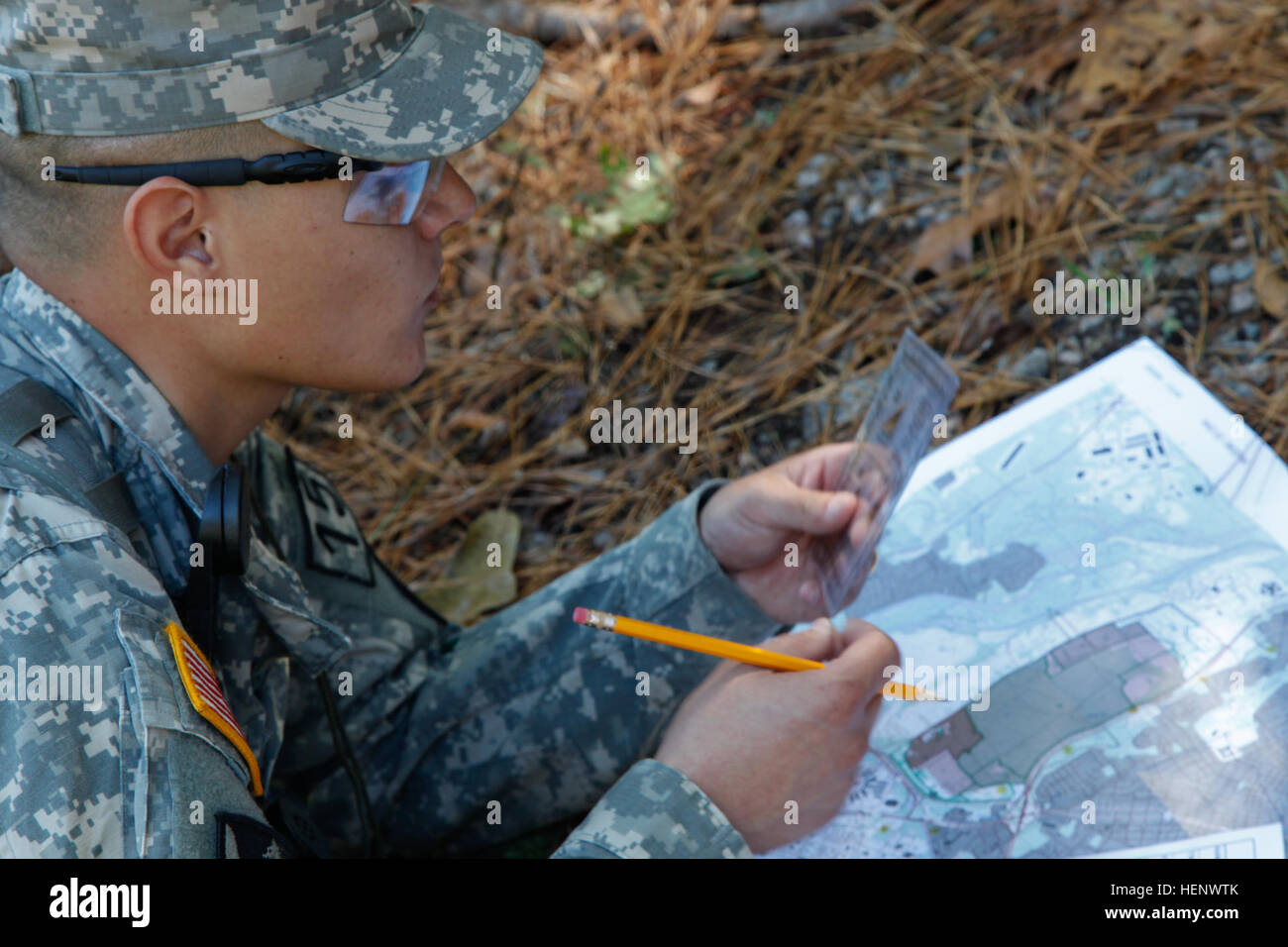 U.S. Army Sgt. Andres Martinez begins the land navigation event during ...