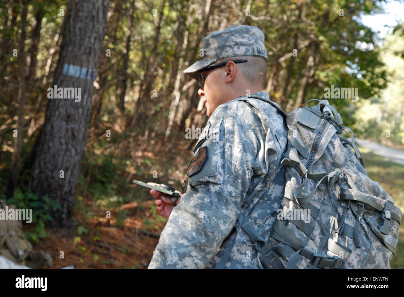 U.S. Army Sgt. Andres Martinez begins the land navigation event during ...