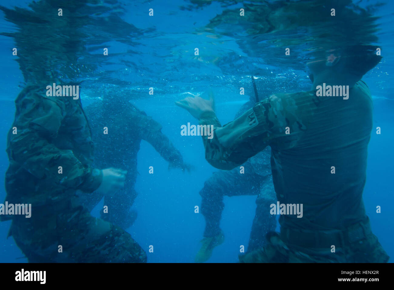 Soldiers assigned to the 7th Special Forces Group (Airborne) tread ...