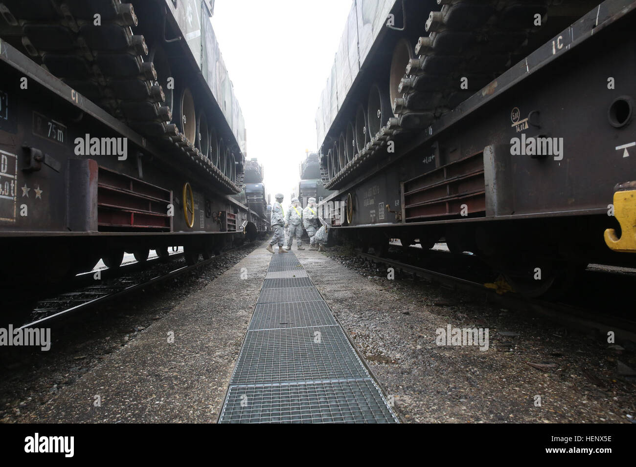 U.S. Soldiers with the 2nd Battalion, 12th Cavalry Regiment place iron ...