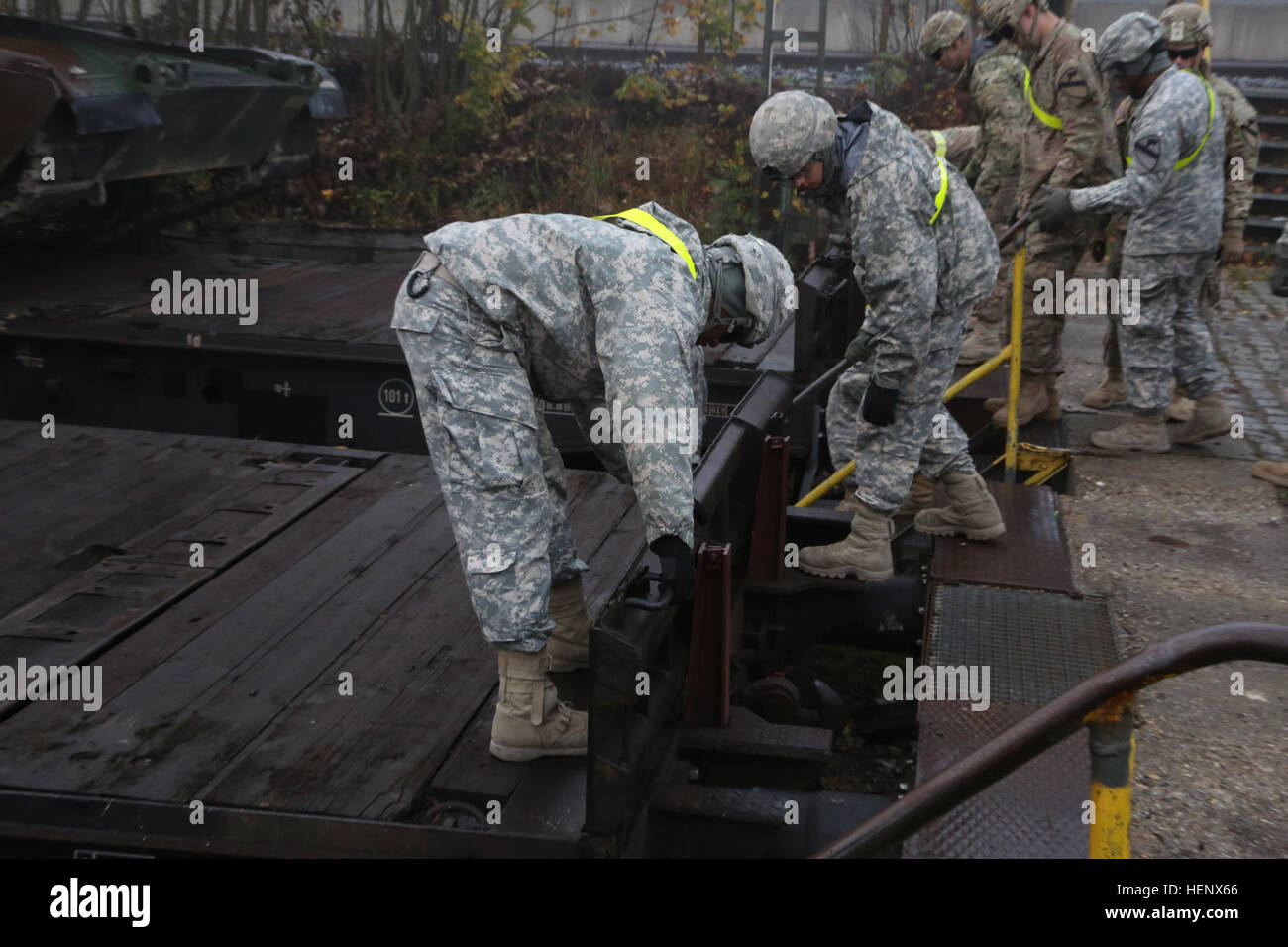 U.S. Soldiers of 2nd Battalion, 12th Cavalry Regiment lower rail car ...
