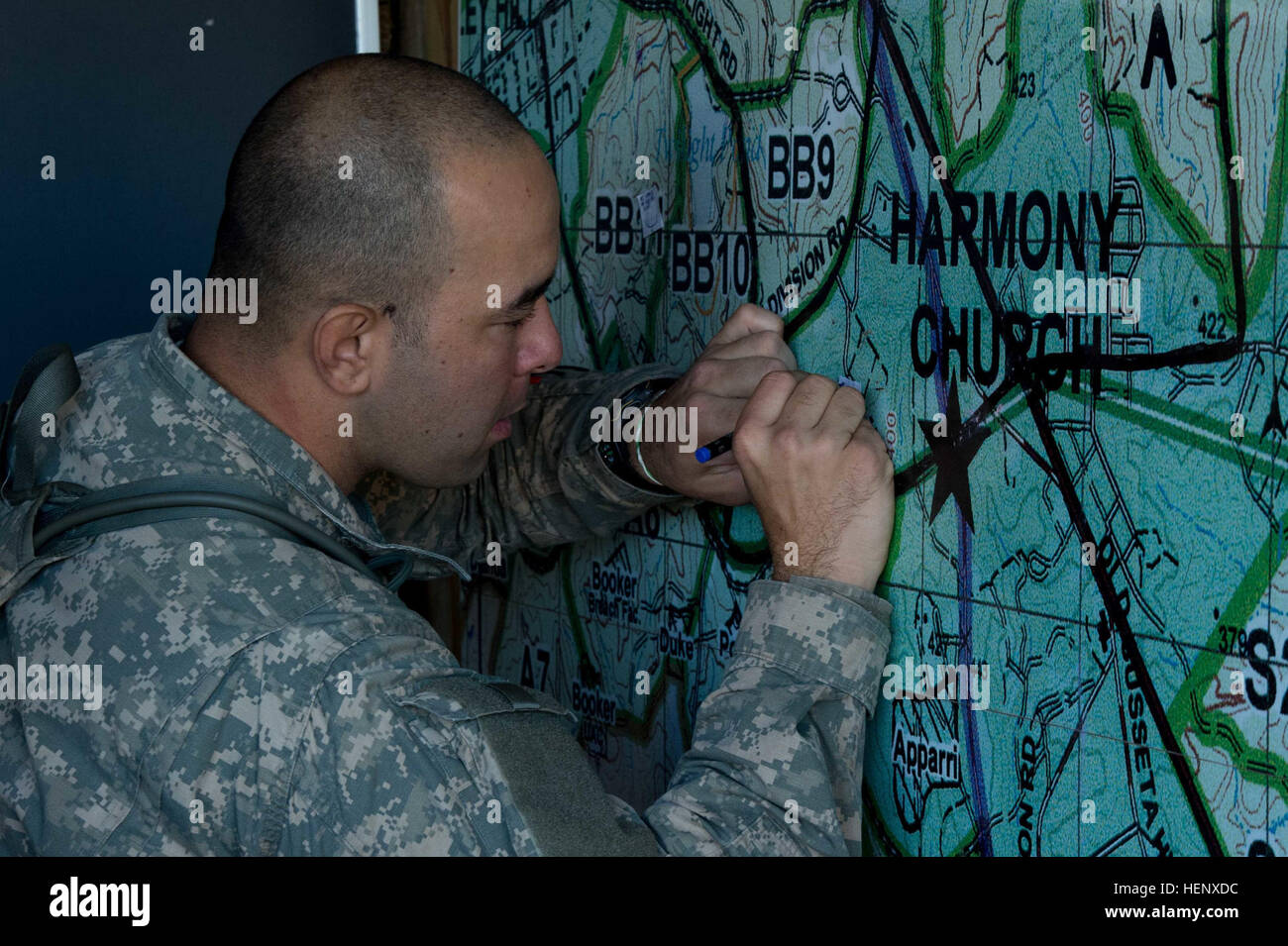 A U.S. Army Soldier plots land navigation points during the Ranger ...