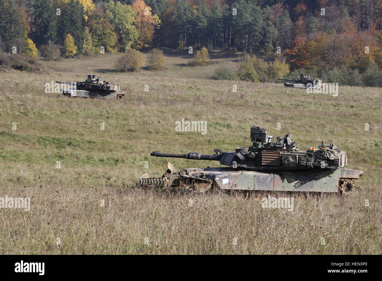 U.S. Army M1A1 Abrams tanks of 2nd Battalion, 12th Cavalry Regiment ...
