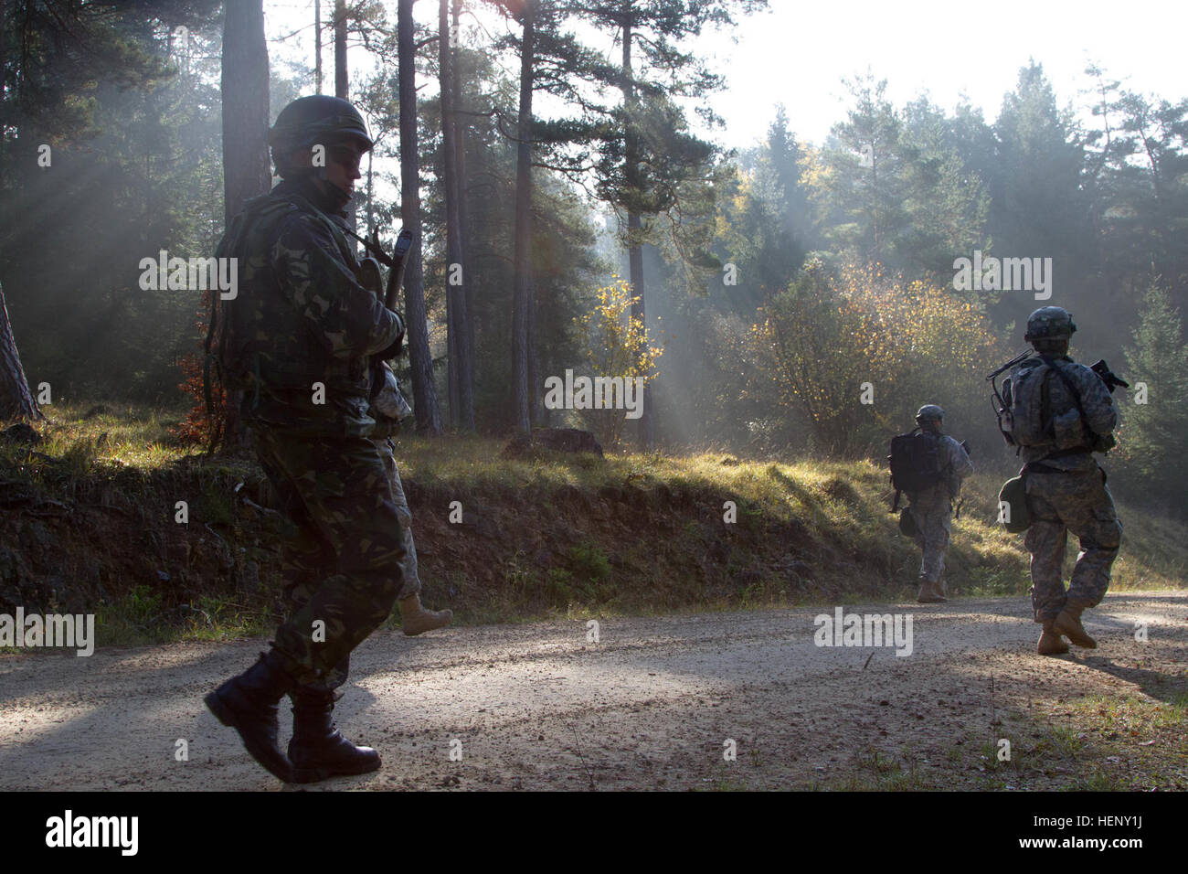 A Romanian soldier marches with Soldiers from 1st Brigade Combat Team ...