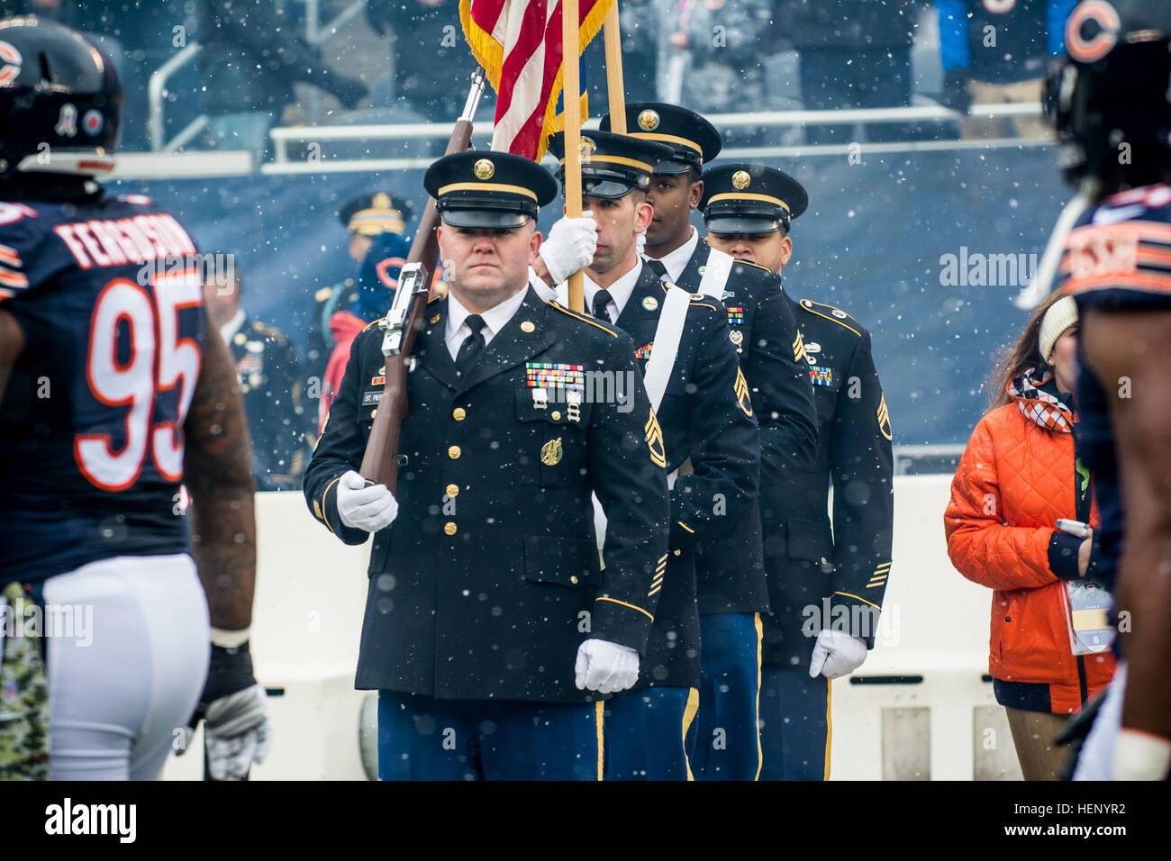 A color guard team from the Chicago Recruiting Battalion carries the ...