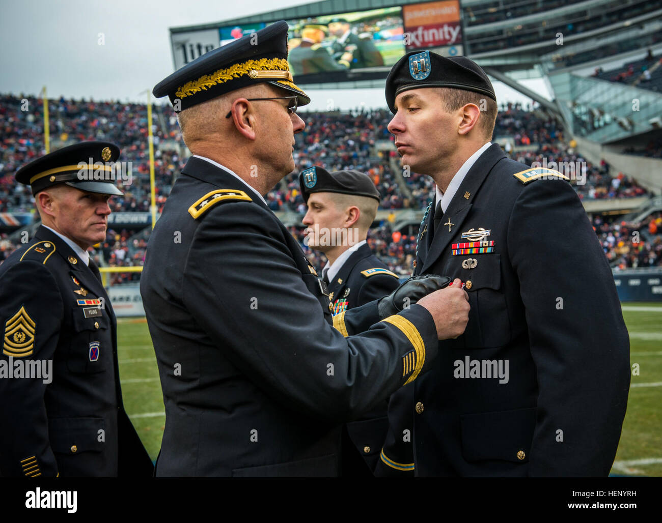 Capt. Ryan Wherfel, receives a Bronze Star from Lt. Gen. Michael S ...