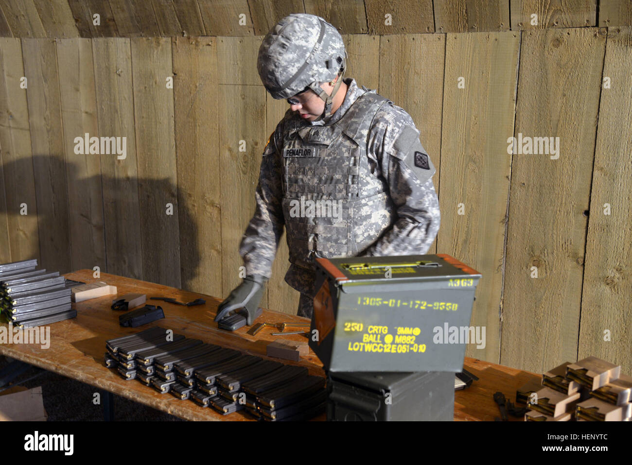 Soldiers from the 52nd Signal Battalion, 5th Signal Command loaded M16 ...