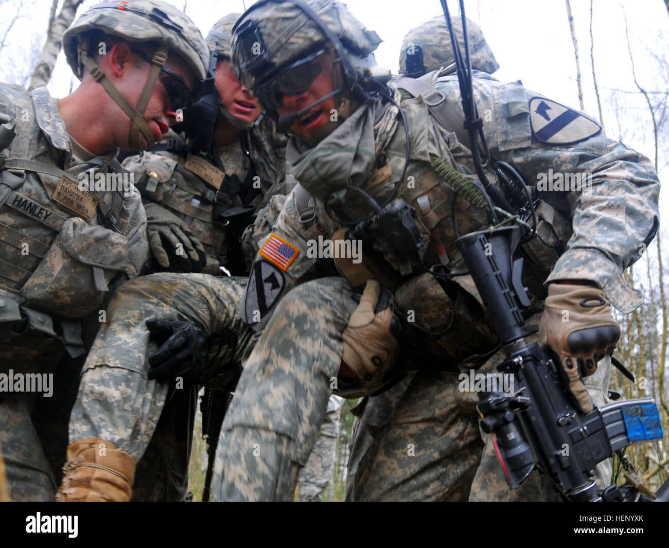 After a Soldier suffering from notional leg wounds falls during a ...