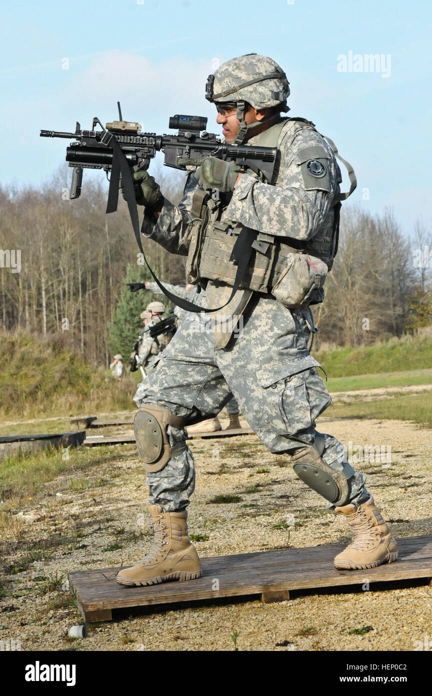 Dragoon Troopers assigned to 1st Squadron, 2nd Cavalry Regiment fire 40 ...