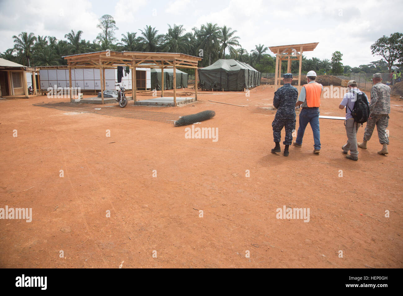 Members of Joint Forces Command – United Assistance tour the site of a ...
