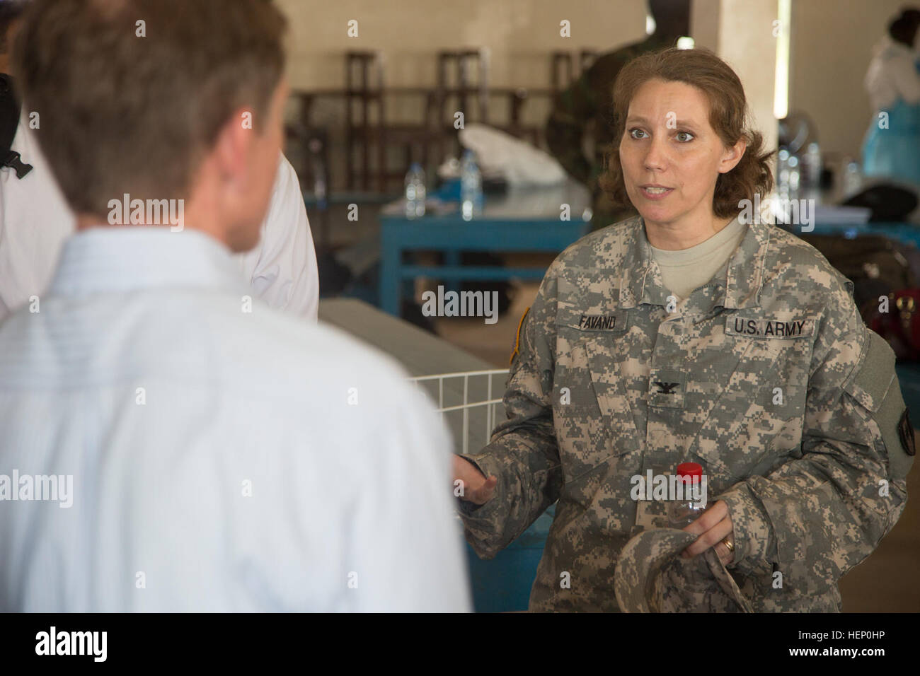 Col. Laura Favand, right, lead medical trainer for the Department of ...