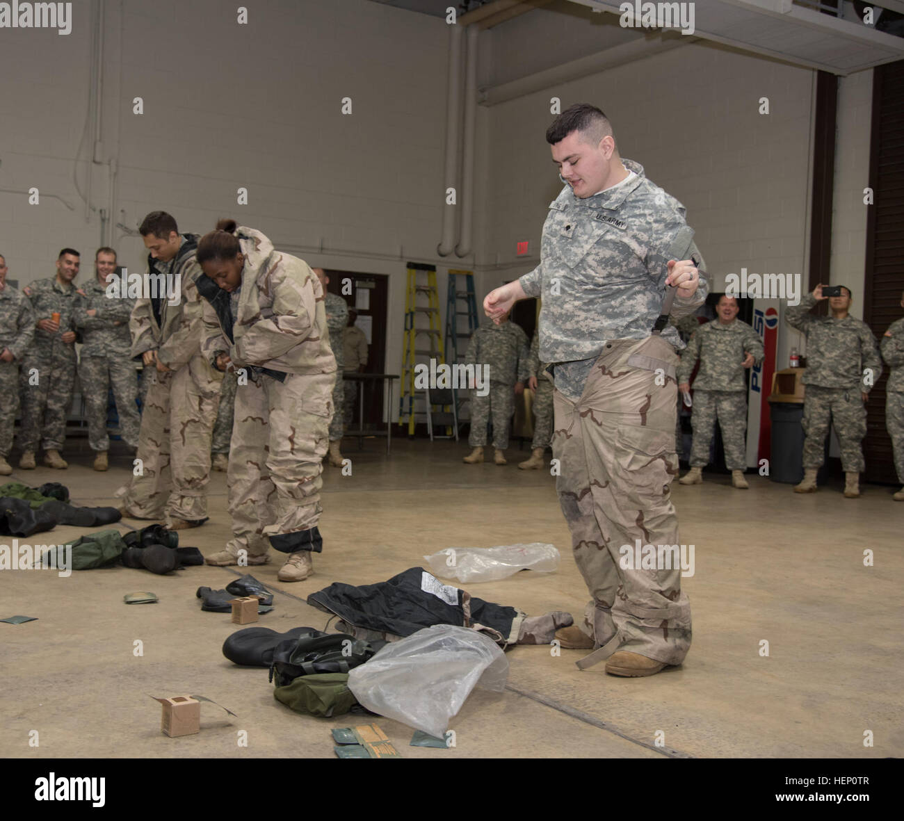 Soldiers of the 153rd Military Police Company conduct chemical gas mask ...