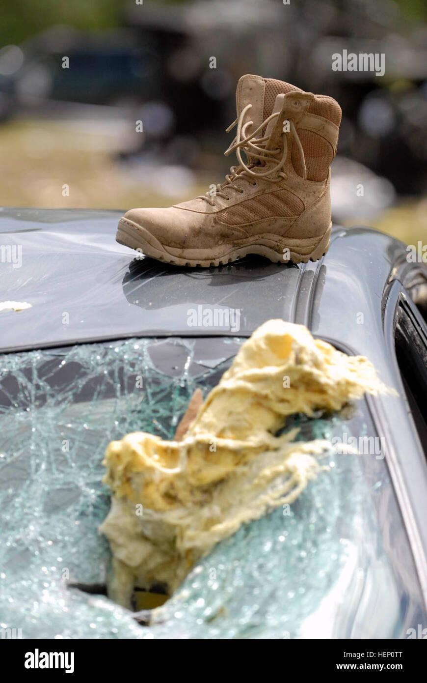 A boot sits on a destroyed vehicle after a F2 tornado ripped through ...