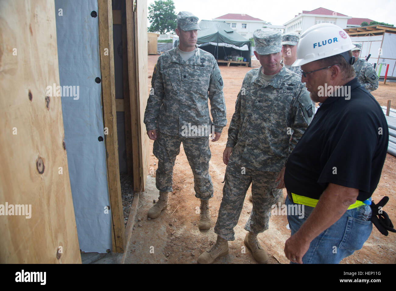 From left, Lt. Col. Lee Hicks, Joint Forces Command – United Assistance ...