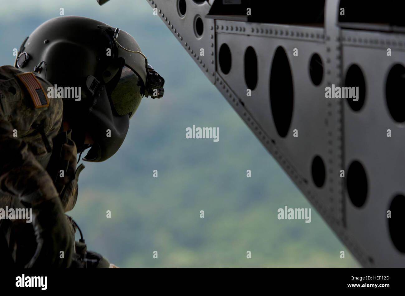 A CH-47 Chinook helicopter crew chief with Task Force Iron Knights, 2nd ...